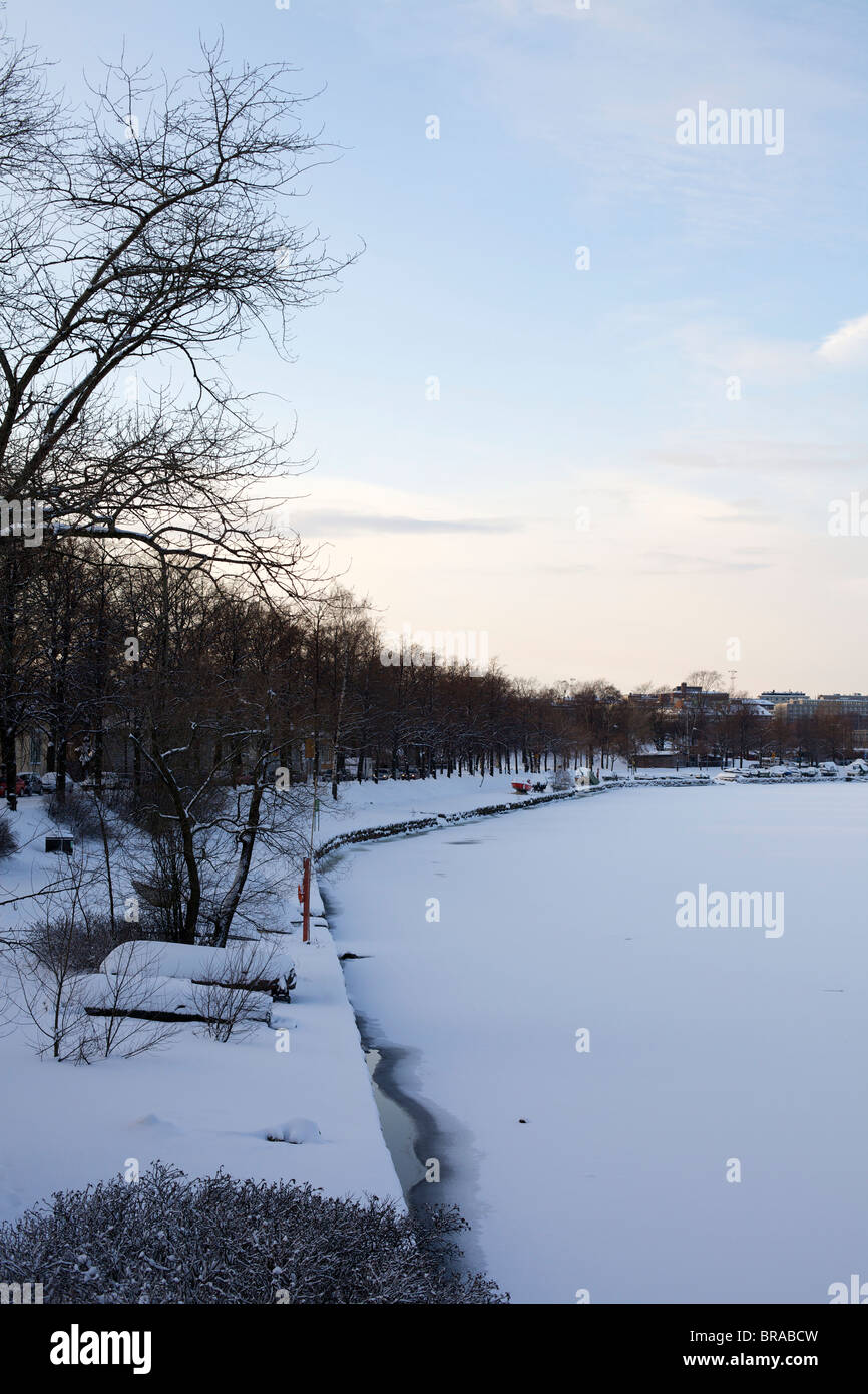 Frozen river seen from Pitkasilta Bridge, Helsinki, Finland ...