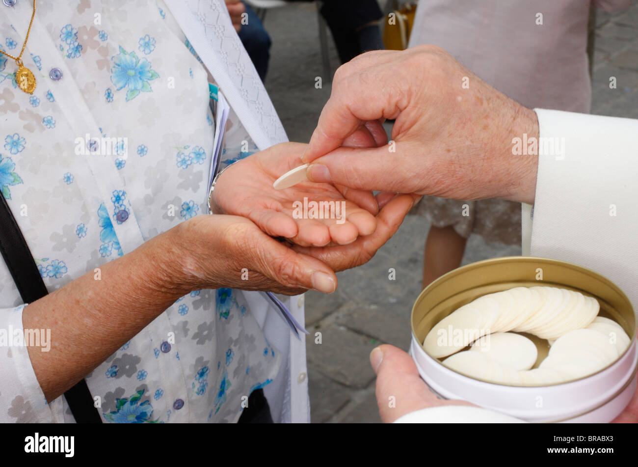Receiving communion hi-res stock photography and images - Alamy