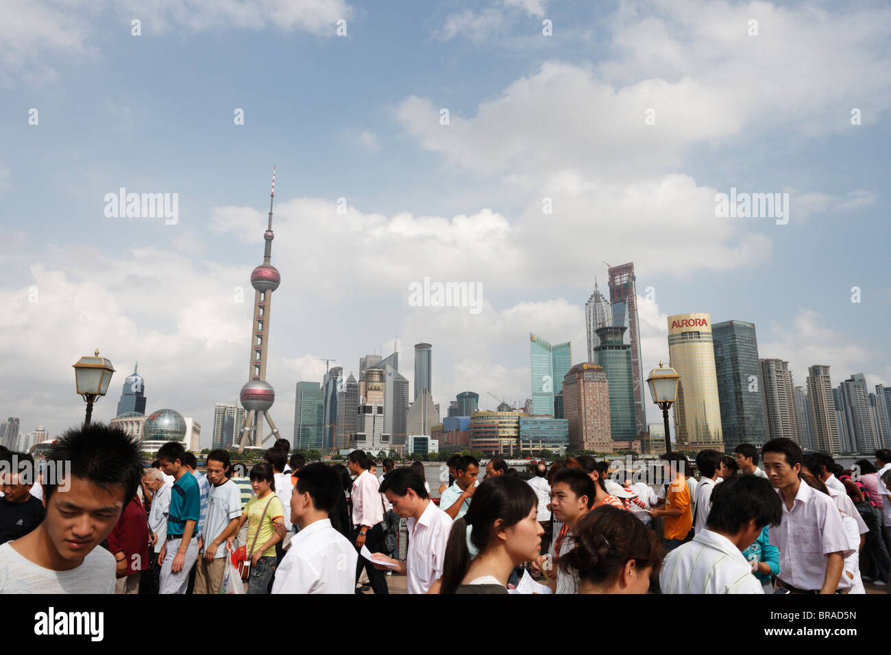 Pedestrians crowd the Bund in Shanghai on China's Independence Day ...