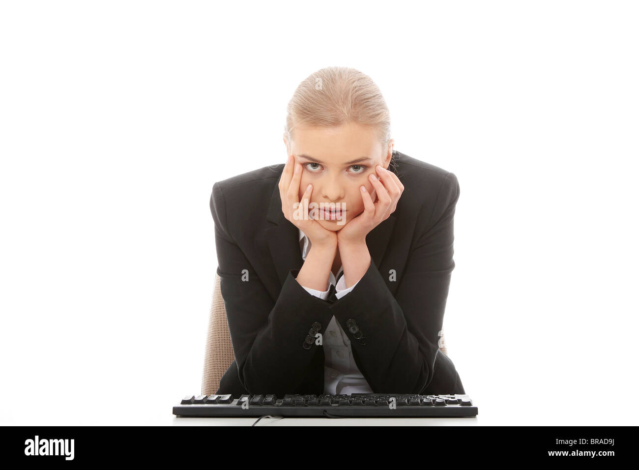 Bored businesswoman working on pc, isolated on white background Stock ...