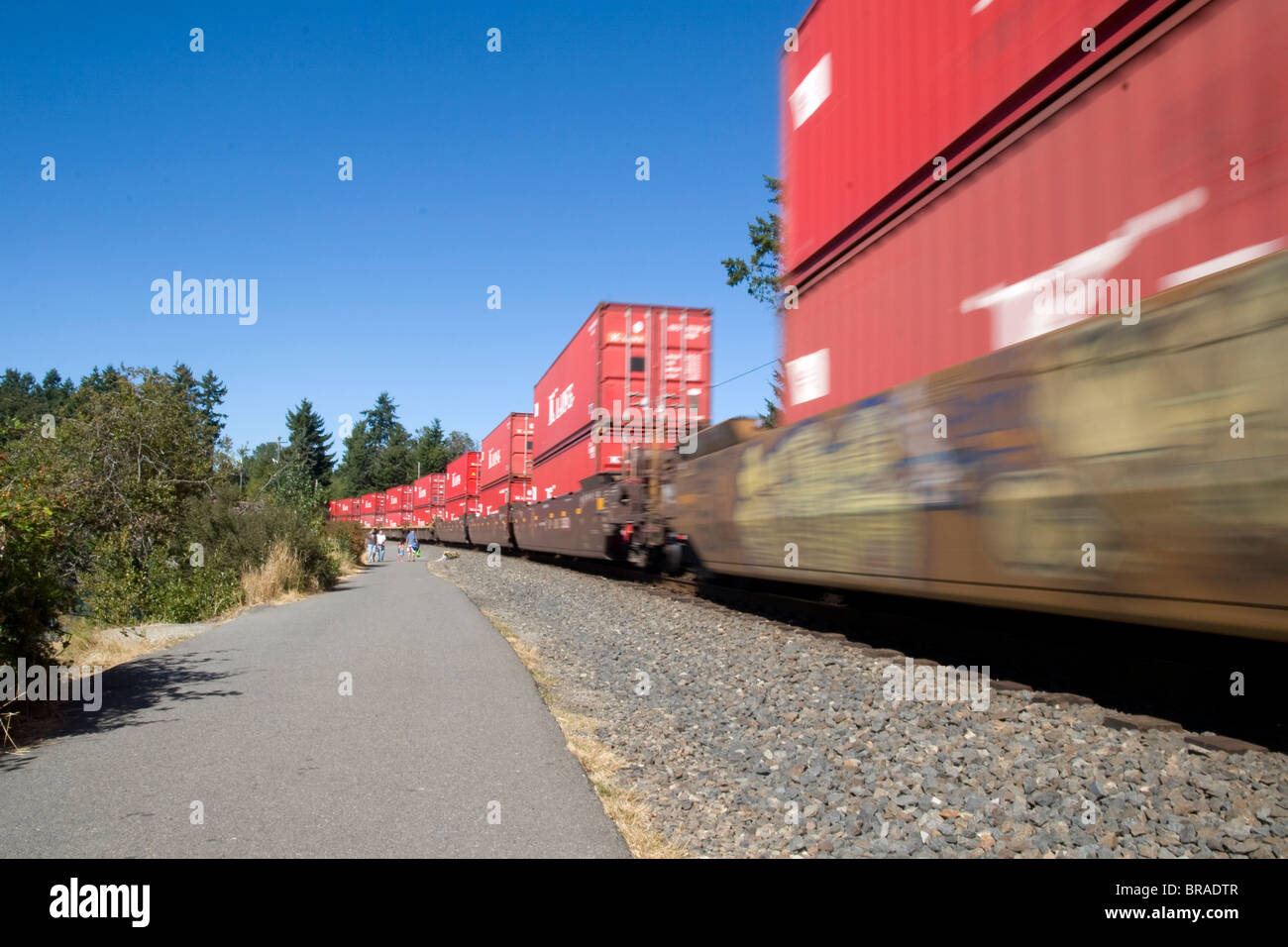 Container freight train passes at speed at Tacoma WA USA United States ...