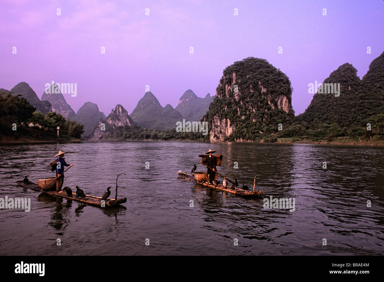 Colorful scenic of the bird fishermen on the Li River in Gulin China ...