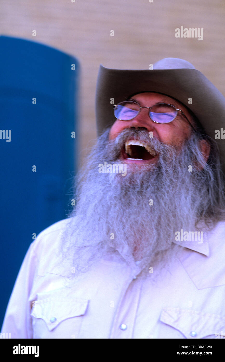 Abstract portrait of laughing cowboy with gray beard in Billings ...