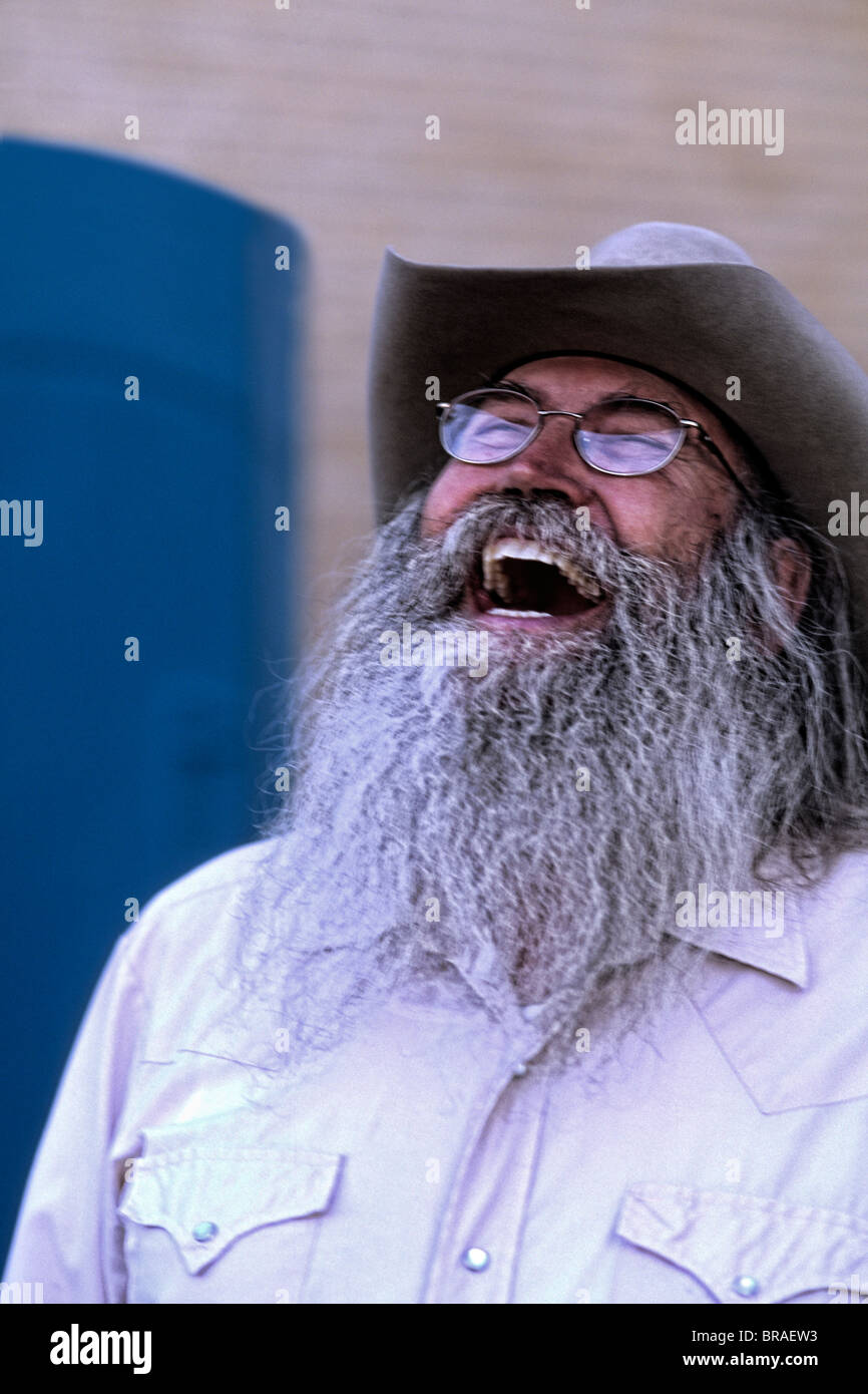 Abstract portrait of laughing cowboy with gray beard in Billings ...