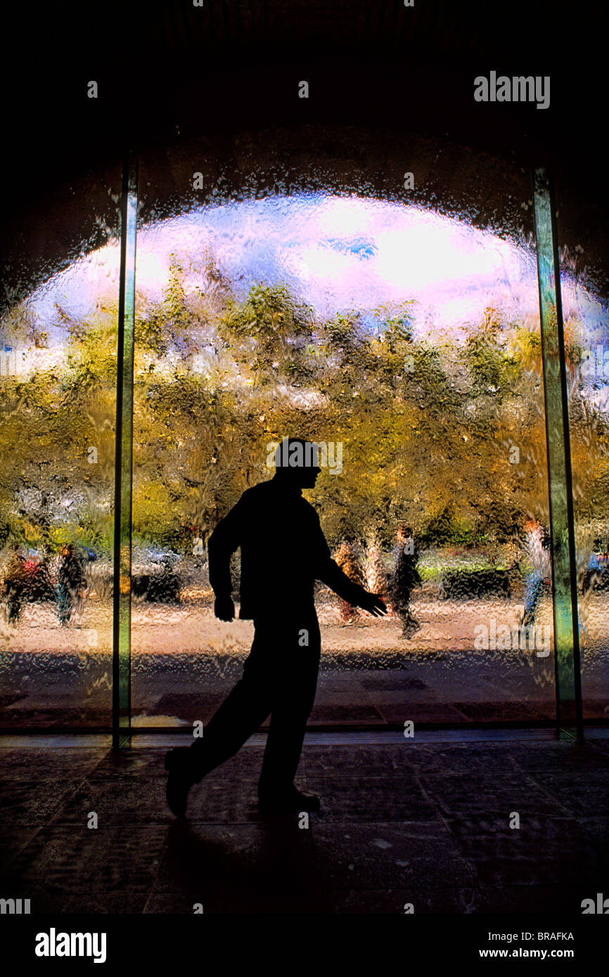 Man walking with water sculpture in National Gallery of Melbourne ...