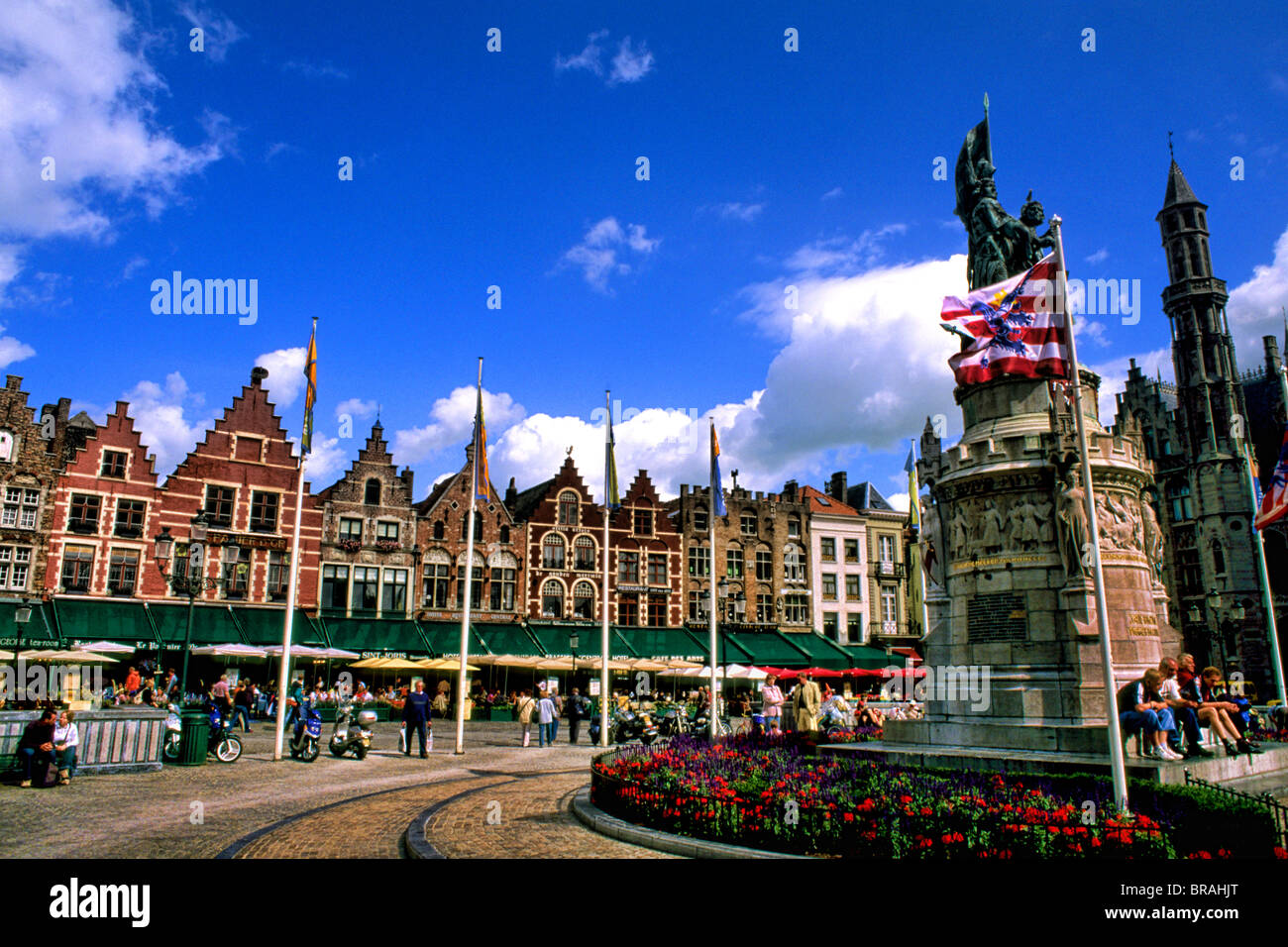 Belgium statue called The Visitors and old buildings in the colorful ...
