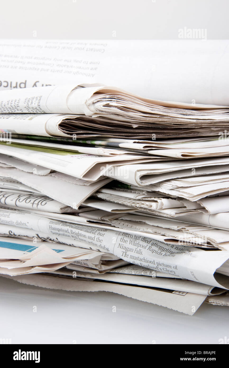 Stack of newspapers Stock Photo - Alamy