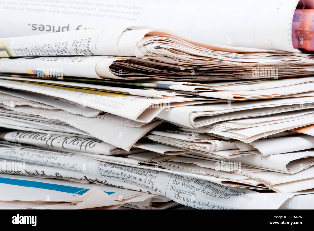 Stack of newspapers Stock Photo - Alamy