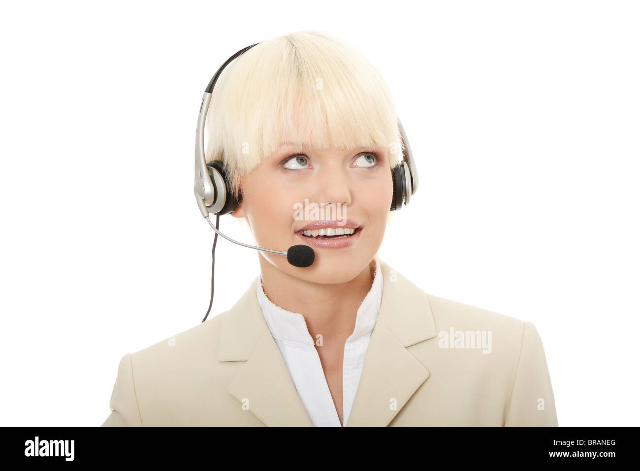 Call center woman with headset looking up right corner. Isolated on ...