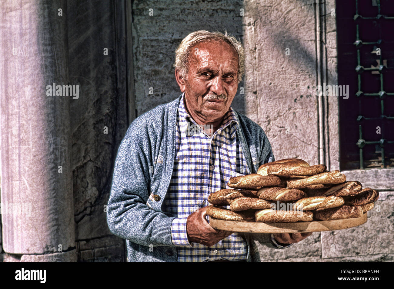Local man selling bread with colorful scene in Istanbul Turkey Stock ...