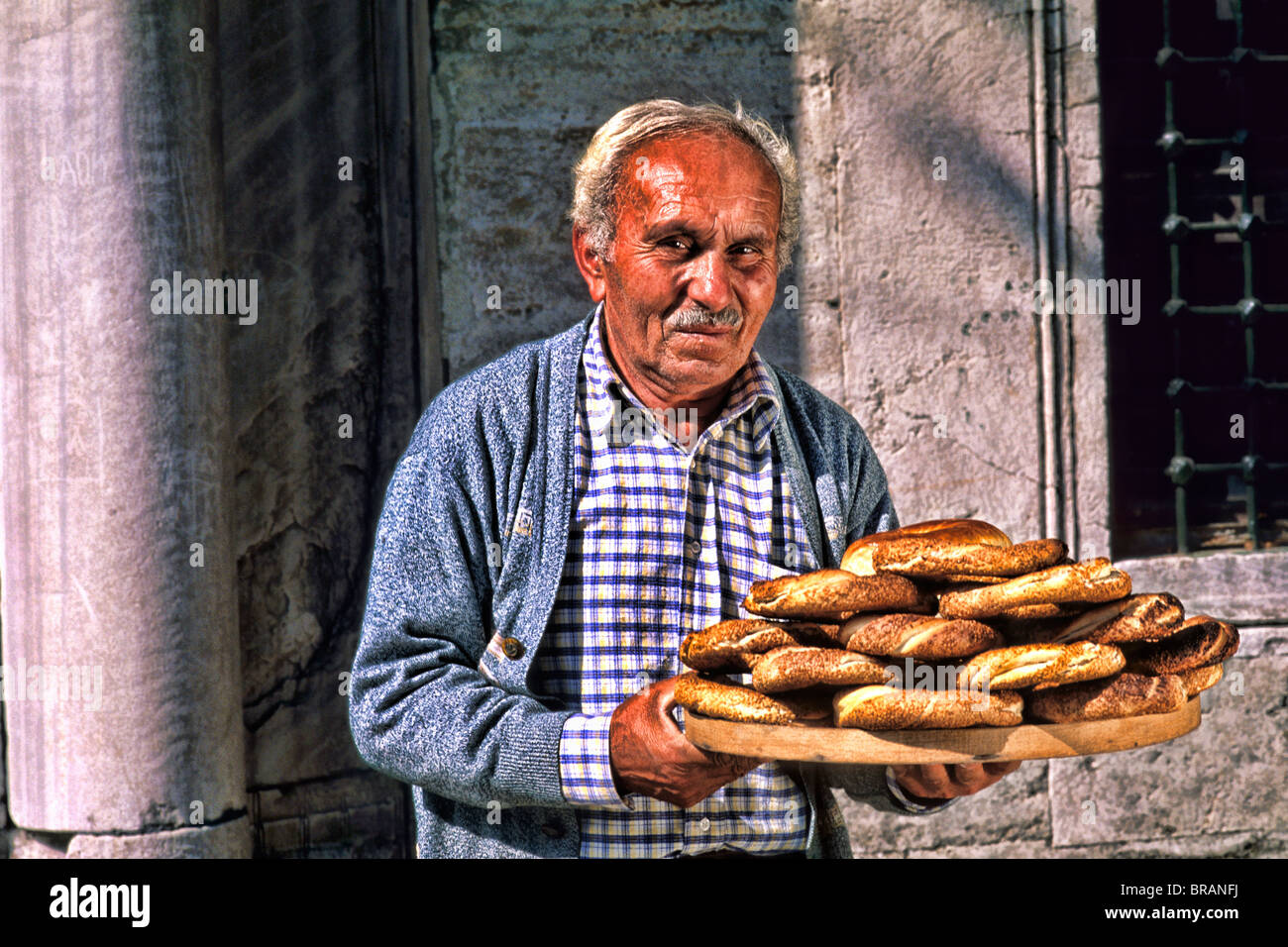 Local man selling bread with colorful scene in Istanbul Turkey Stock ...