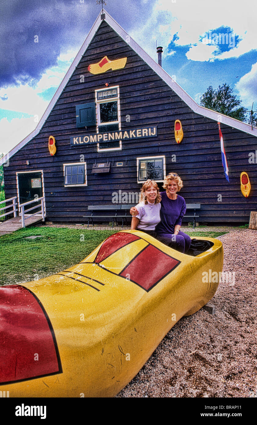 Women tourists at Cheese Factory with giant clog shoe in Volendam ...