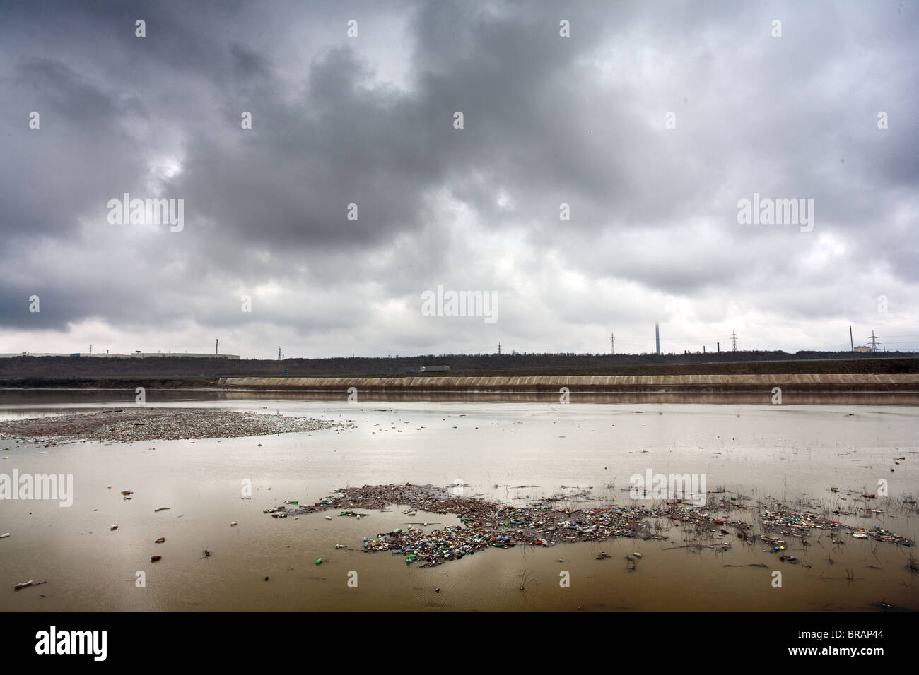 Image of a very polluted river with tons of plastic bottles floating ...