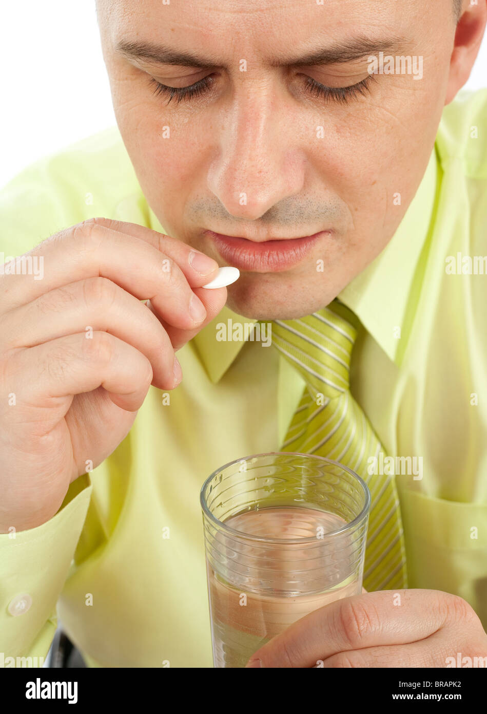 Man taking tablets headache hi-res stock photography and images - Alamy