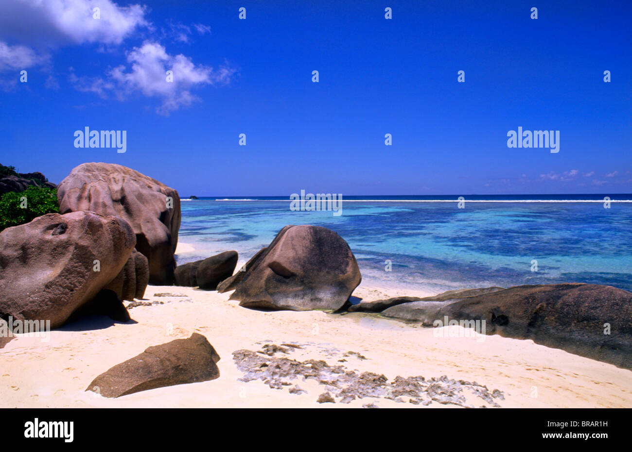 Beautiful perfect scene of the famous rocks and beach at La Digue in ...