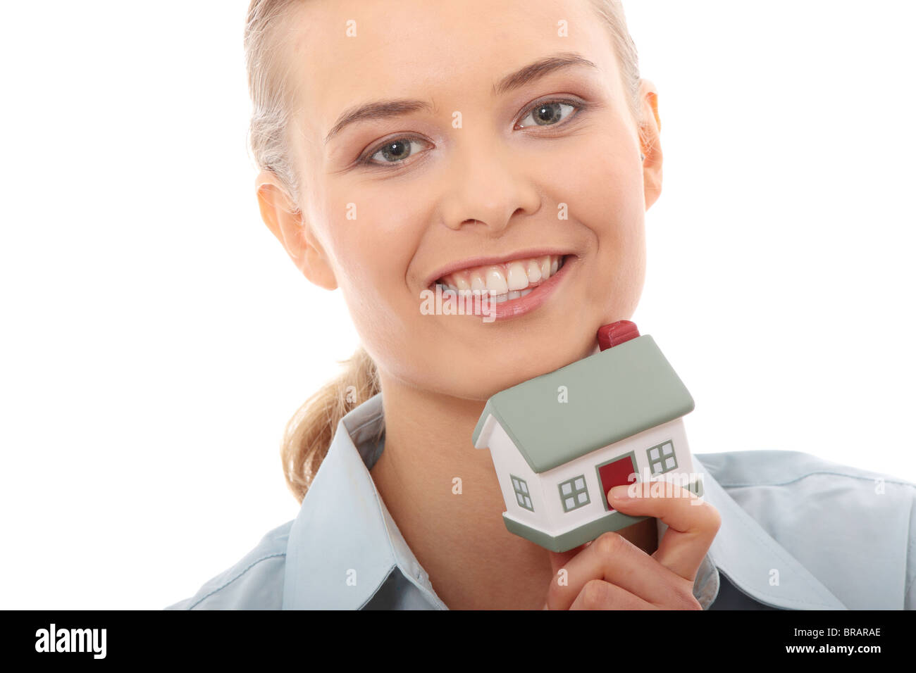 Young beautiful business woman with house model - real estate Stock ...