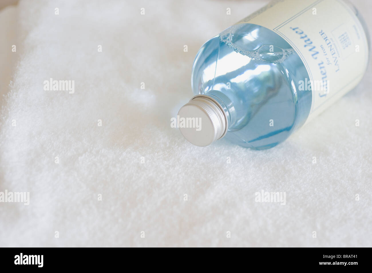 Linen water and towel Stock Photo - Alamy