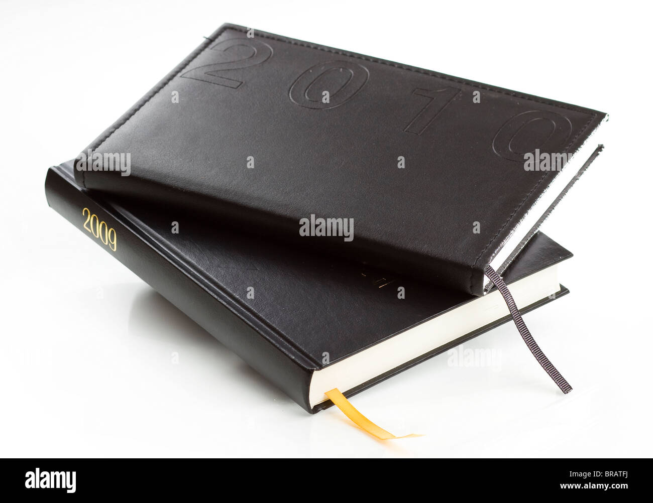 Two books isolated on white background Stock Photo - Alamy