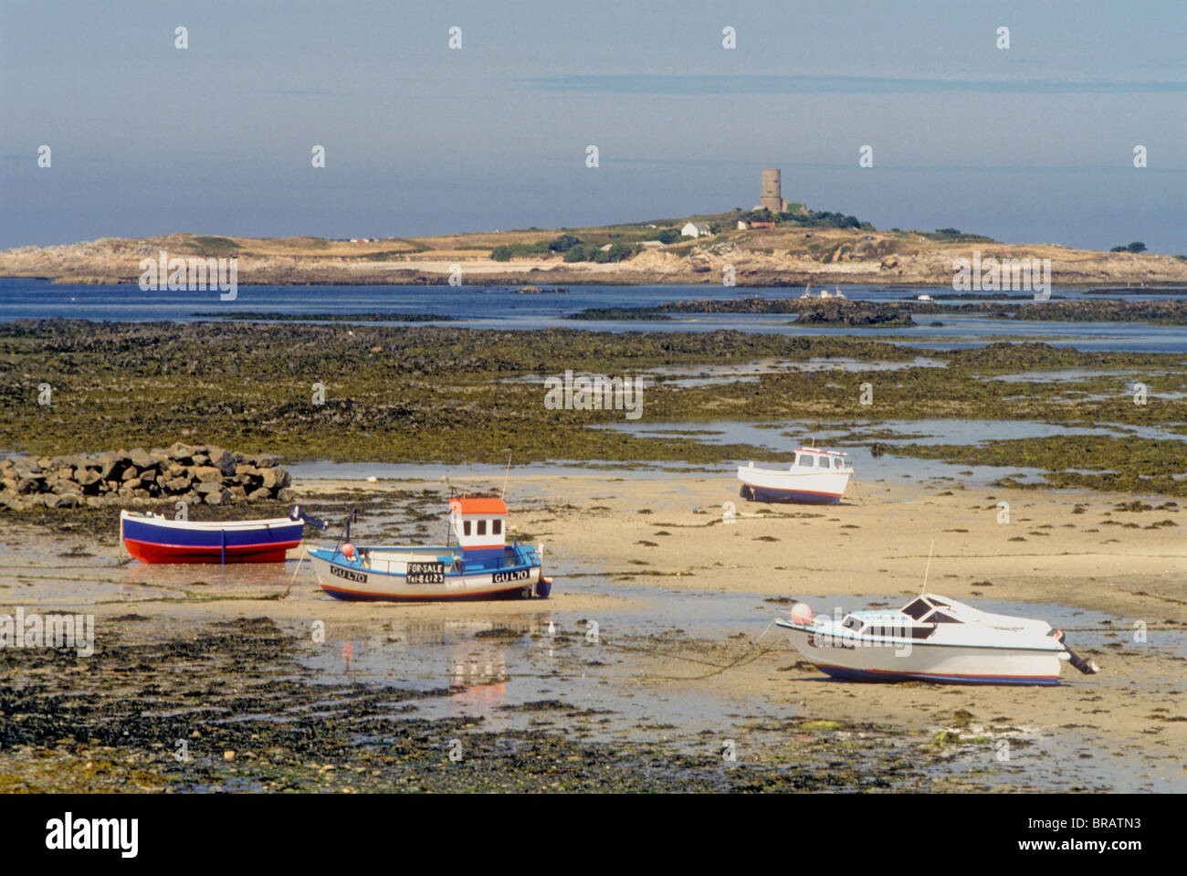 Low tide at Rocquaine Bay, Guernsey, Channel Islands, UK Stock Photo ...