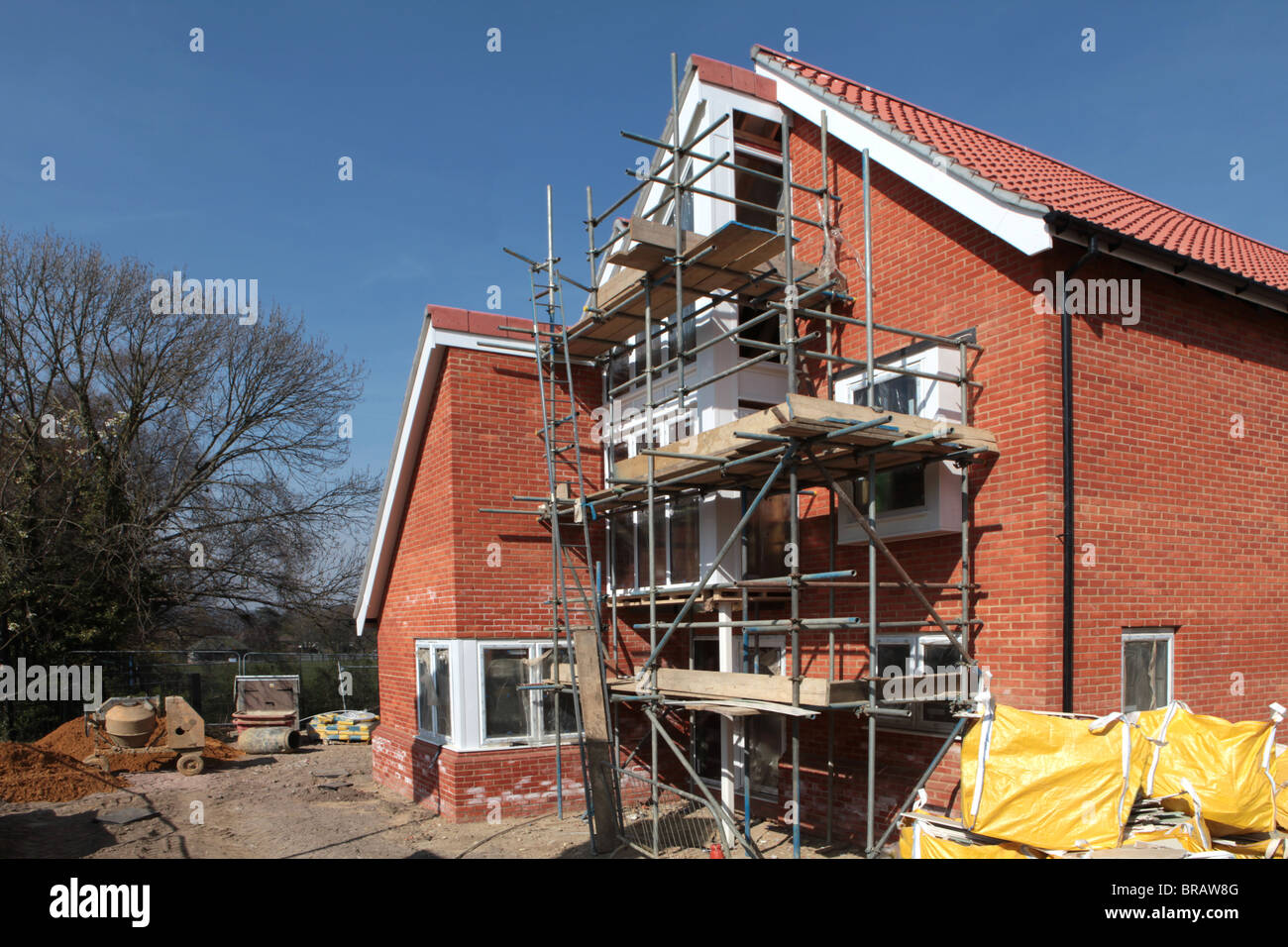Building work on new houses - construction site Stock Photo - Alamy