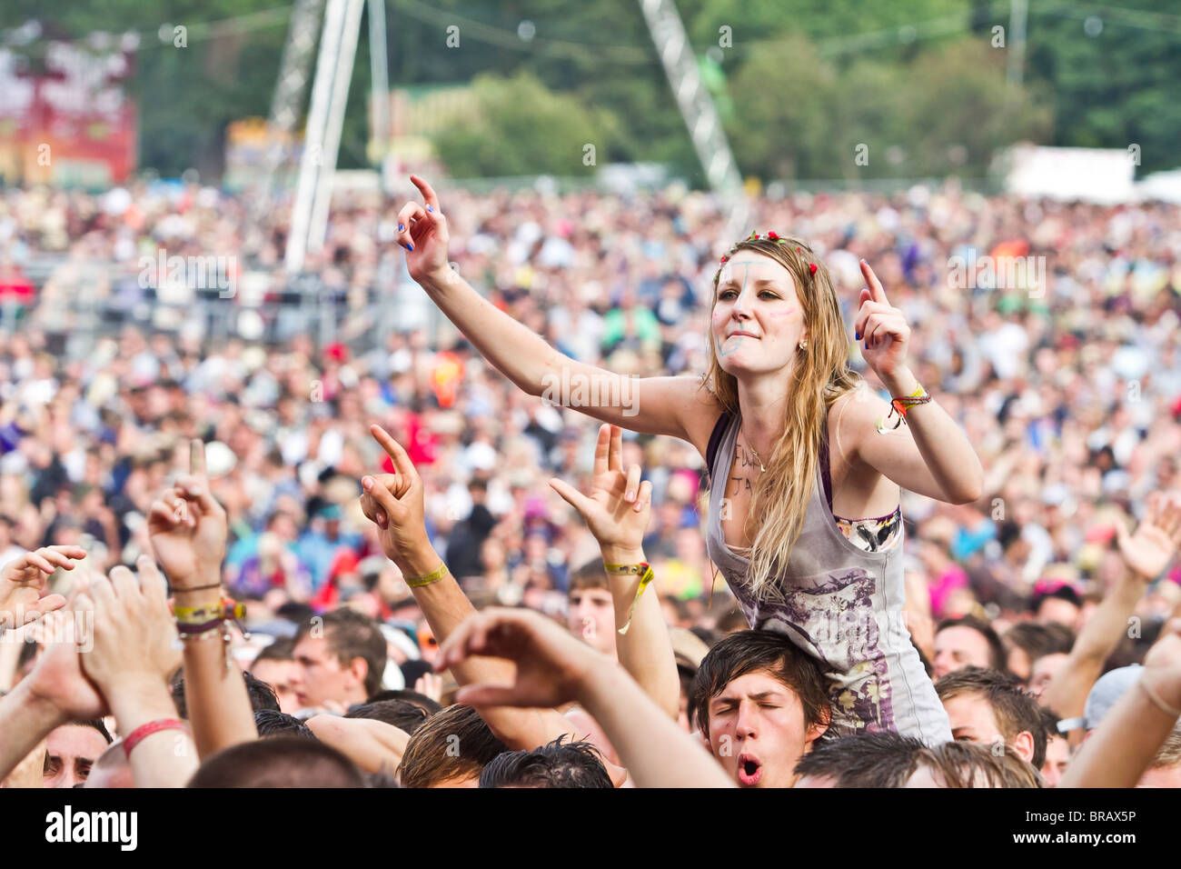 Girl in Festival Crowd Stock Photo - Alamy
