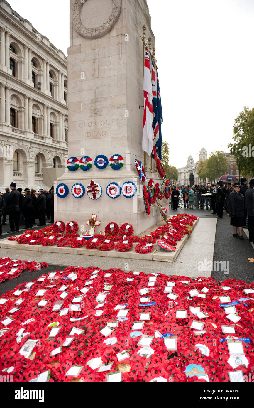Poppies and wreaths spread around The Cenotaph in Whitehall, London ...