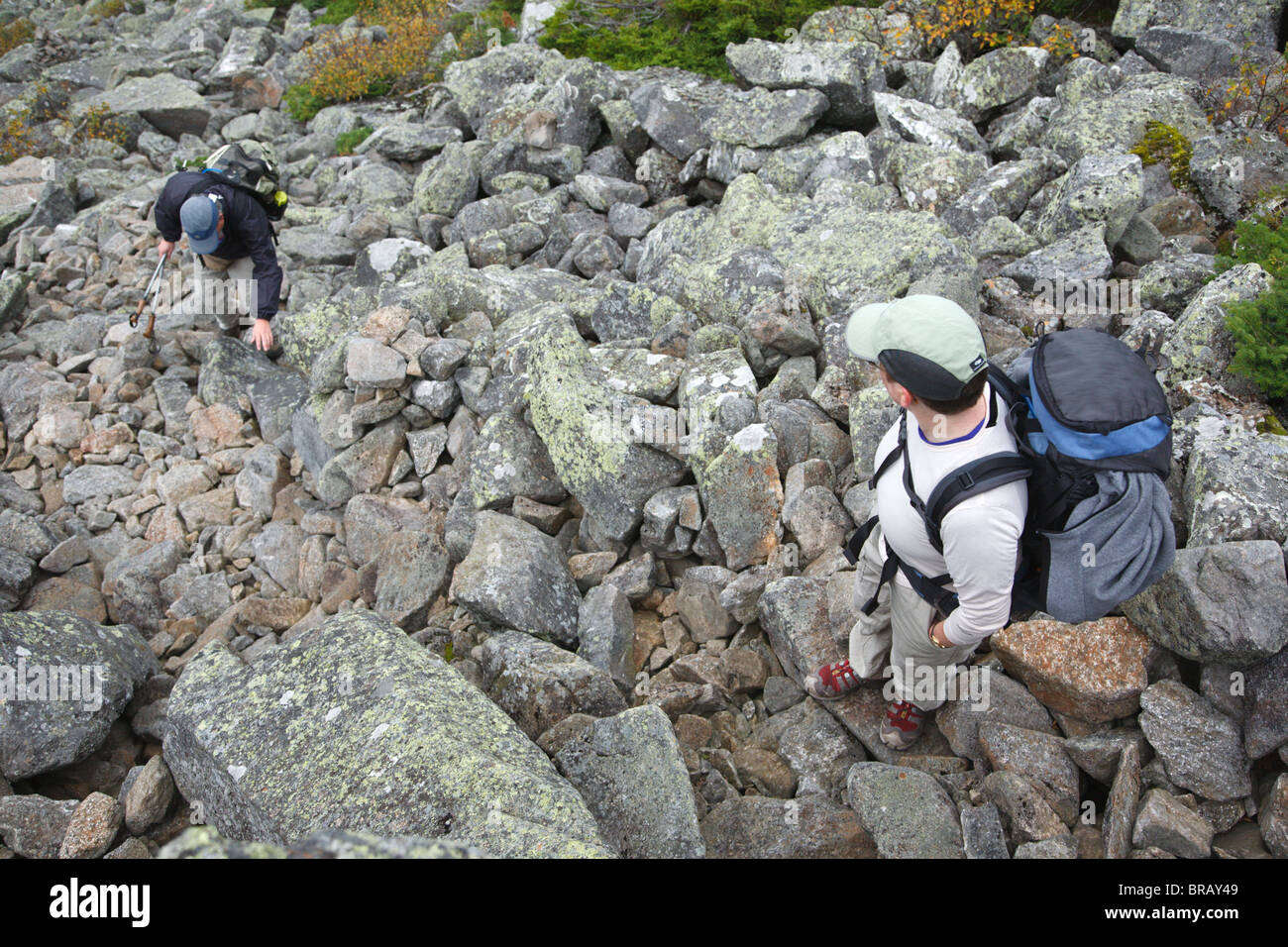 Hikers ascending King Ravine Trail. Located in King Ravine in the White ...