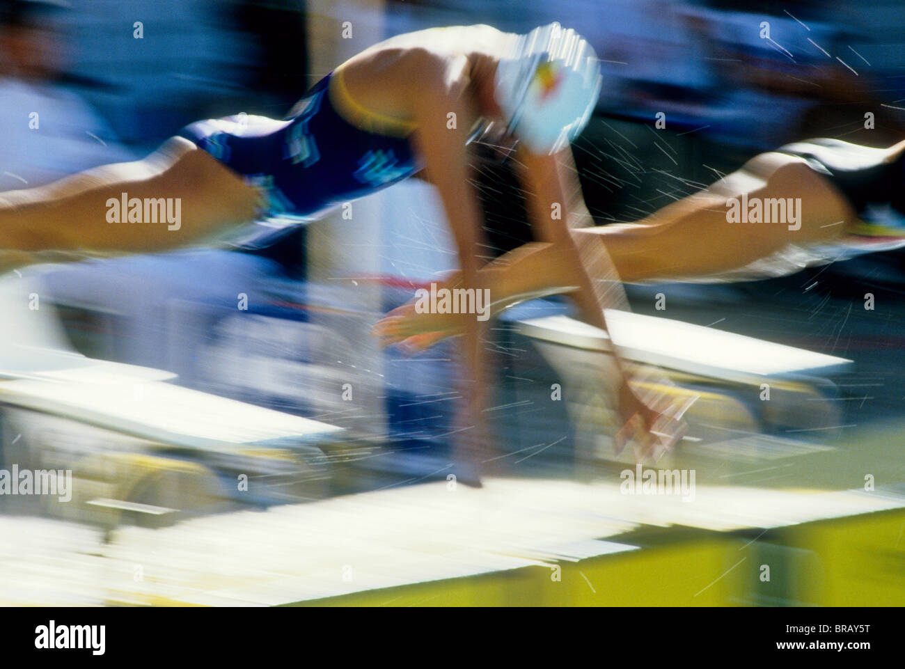 Female swimmer at the start of a race Stock Photo - Alamy