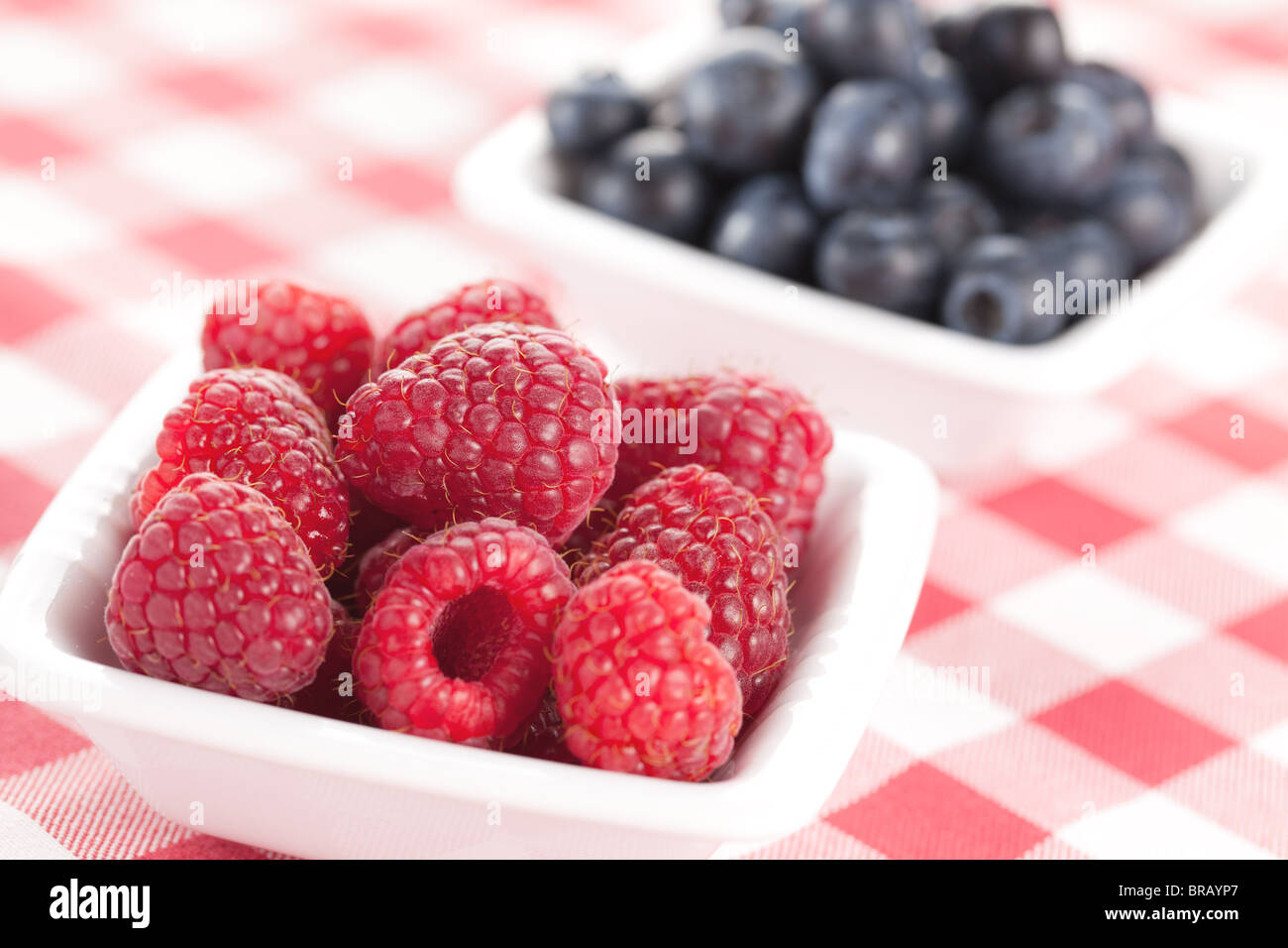 blueberries and raspberries in bowl Stock Photo - Alamy
