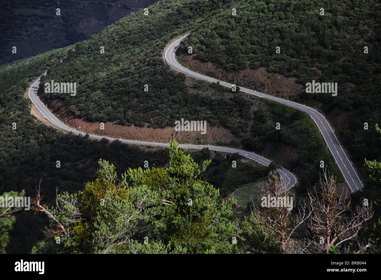 Mountain road East Pyrenees Range around Sort viewed from Coll de Cantó ...