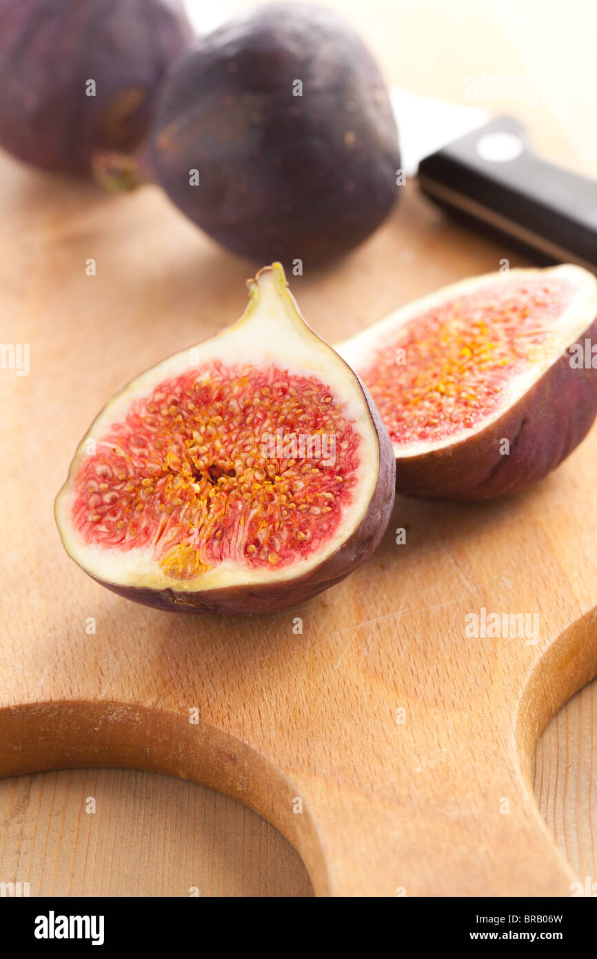 the fig fruit on wooden table Stock Photo - Alamy
