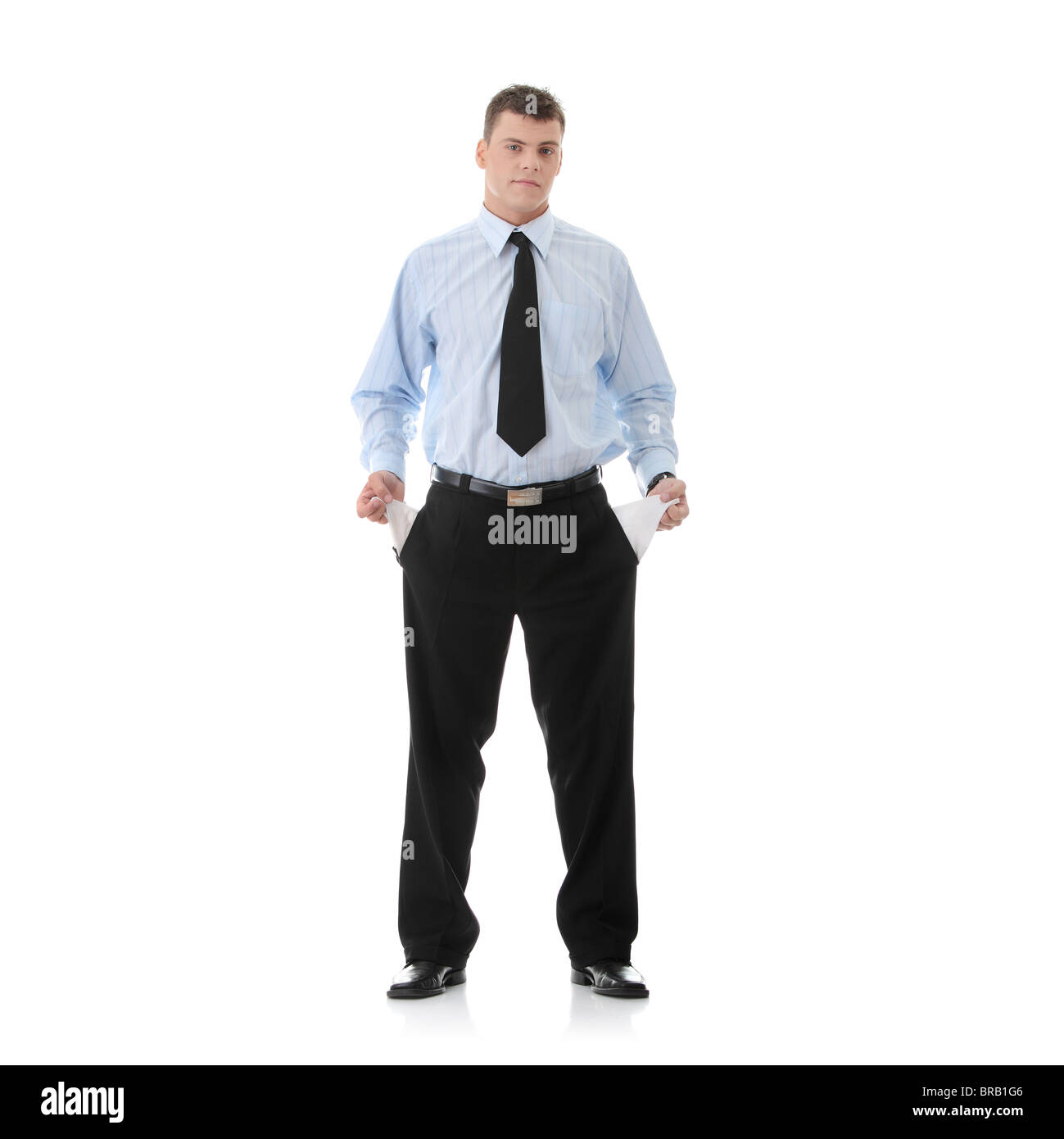 Sad and broke business man with empty pockets Stock Photo - Alamy