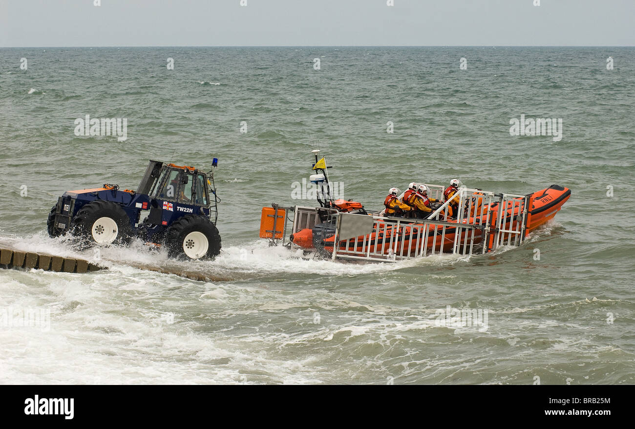 Sheringhams lifeboat taking to the water during a launch exercise Stock ...