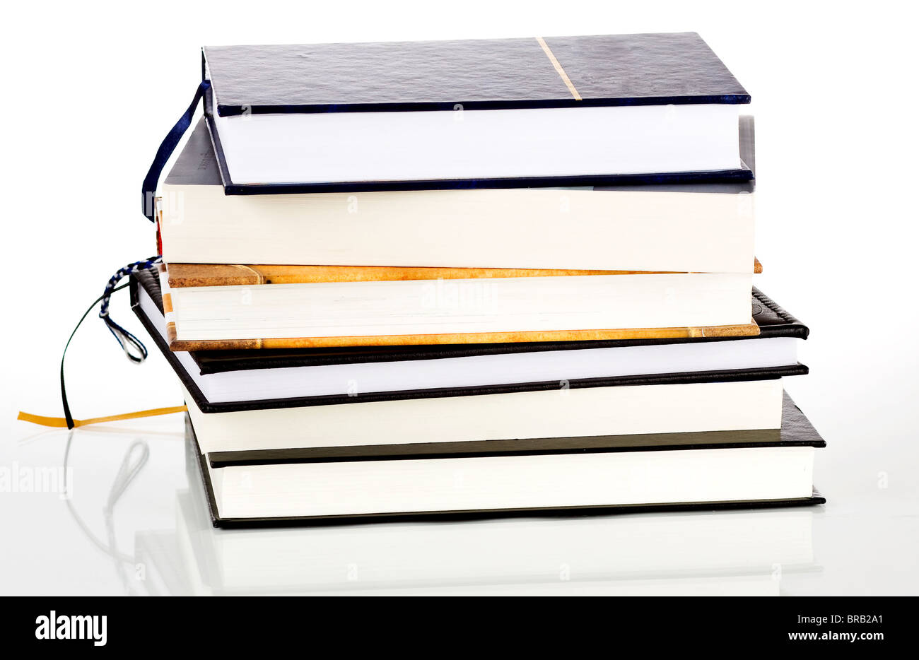 Stack of books isolated on white background Stock Photo - Alamy