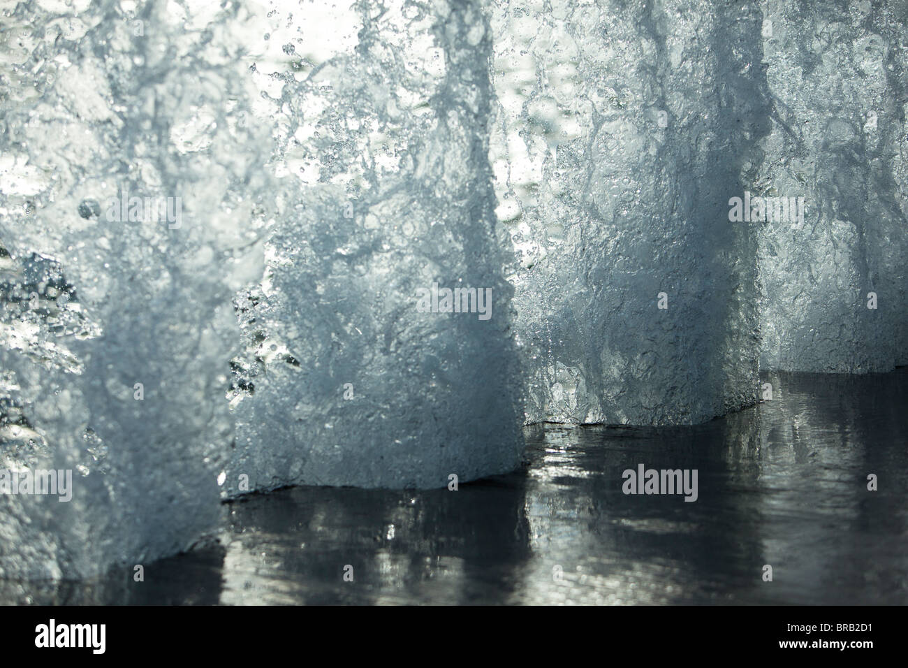 Frozen water droplets and water splashing Stock Photo - Alamy