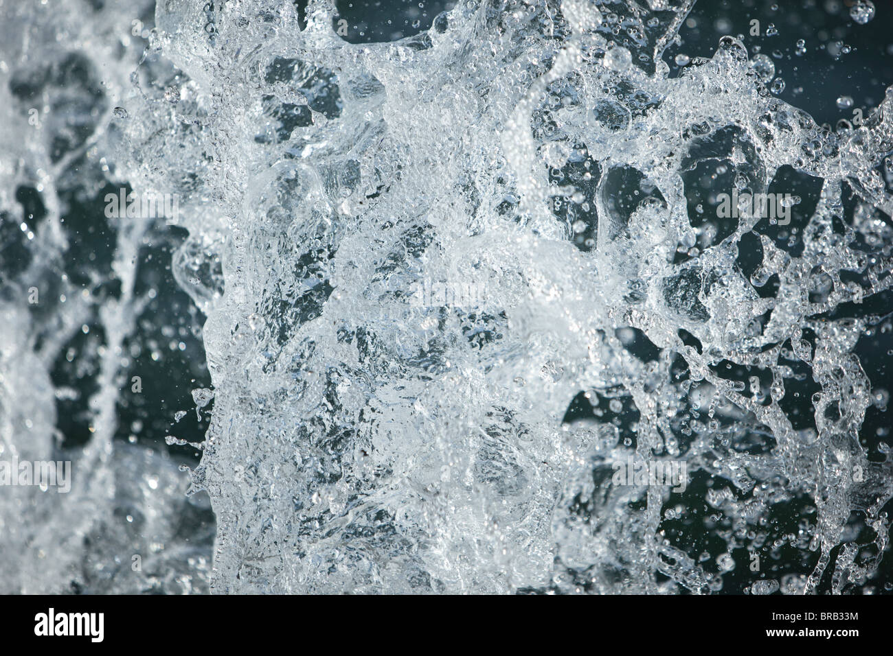 Frozen water droplets and water splashing Stock Photo - Alamy