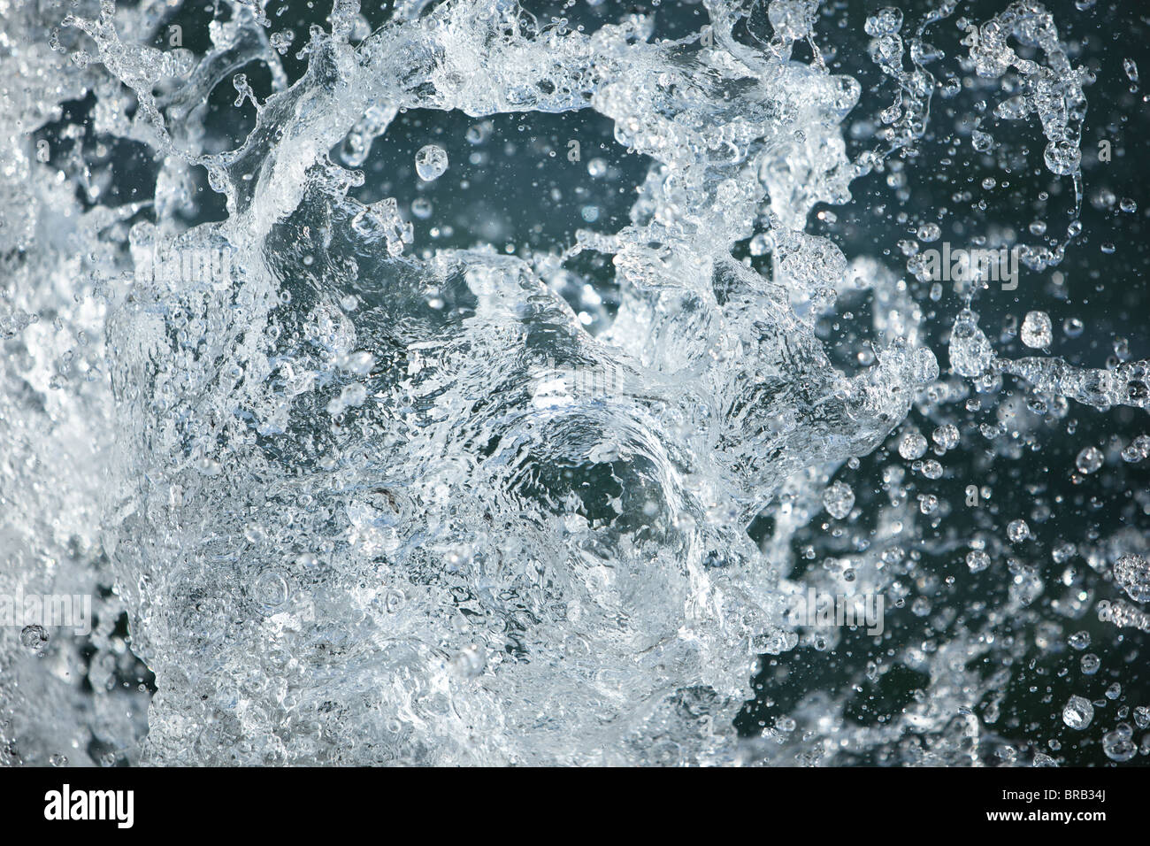 Frozen water droplets and water splashing Stock Photo - Alamy