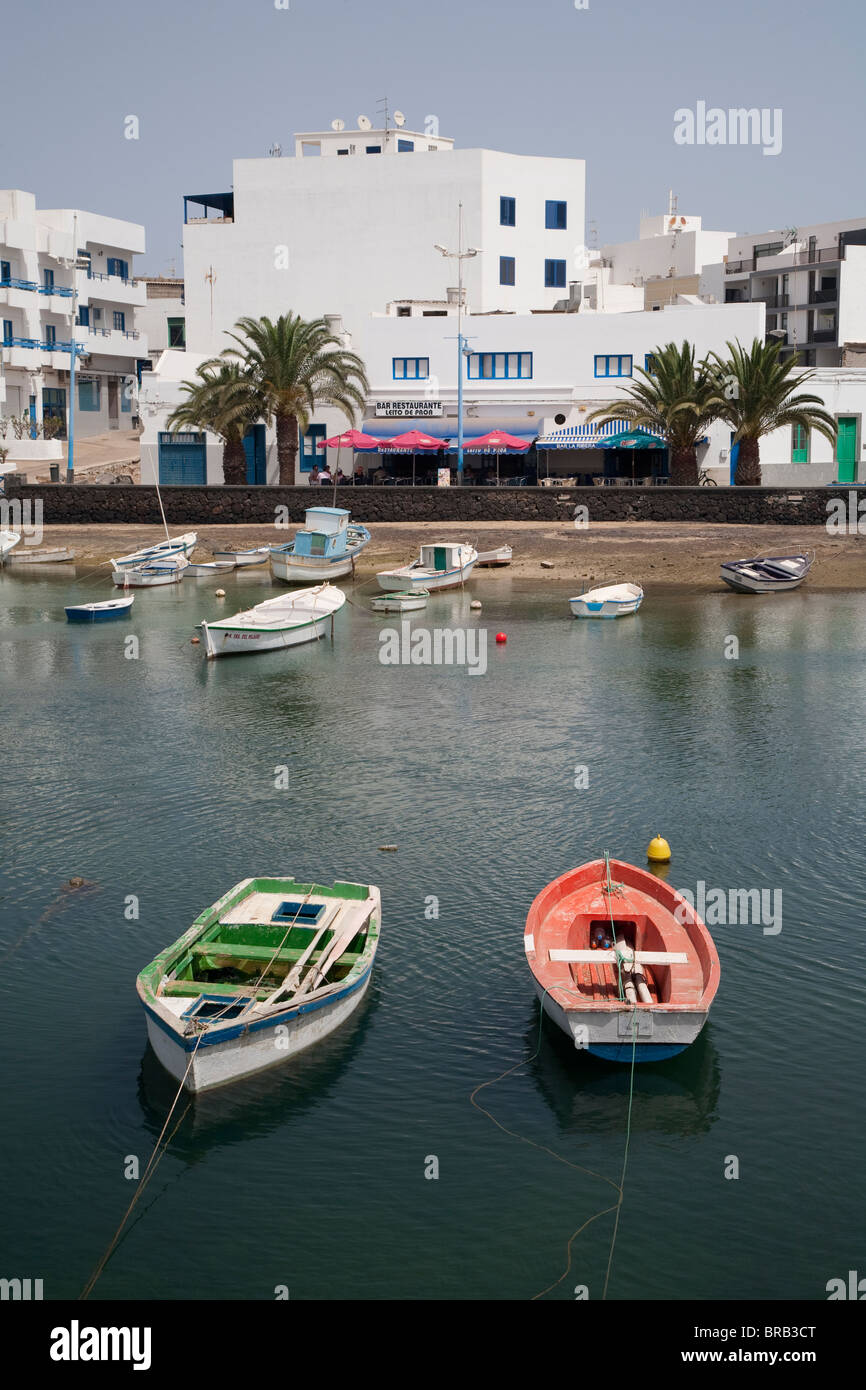 Fishing boats in tidal Charco de San Gines, Arrecife, Lanzarote Stock ...