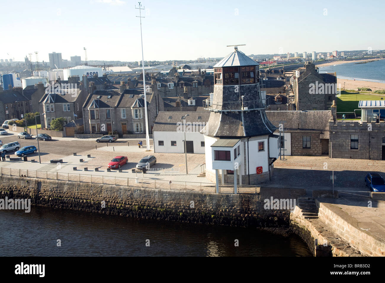Old lighthouse and housing, Pocra Quay, Aberdeen, Scotland Stock Photo ...