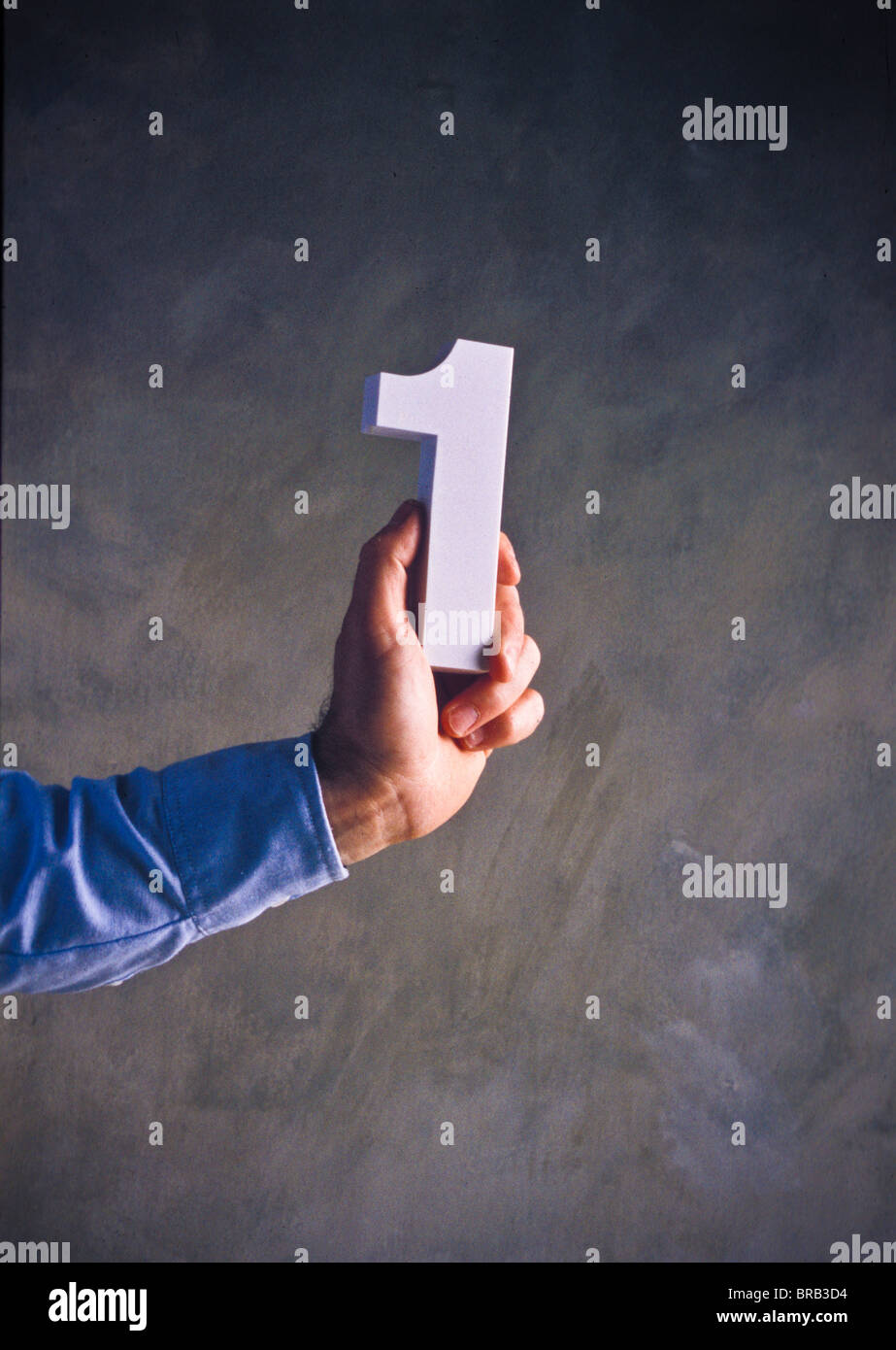 One male hand, finger number one, signifying first, best, winner ...