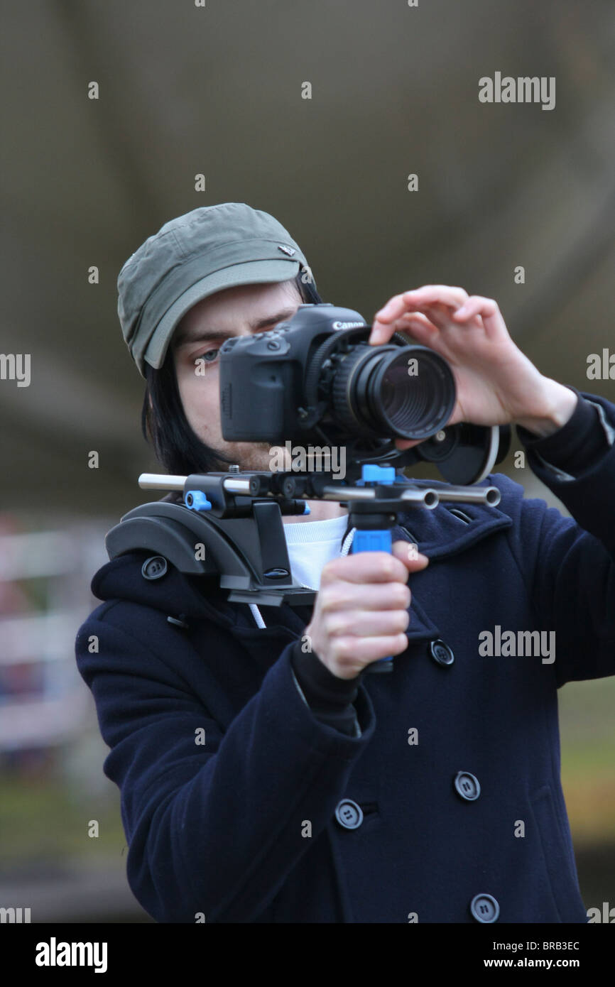 Man using camera Stock Photo - Alamy
