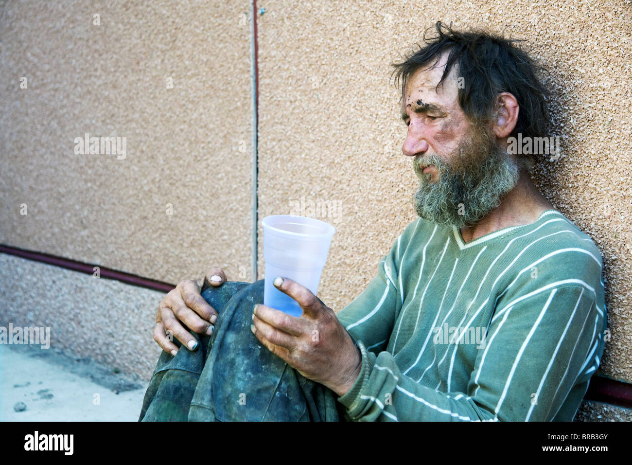 Beggar poverty old man hi-res stock photography and images - Alamy