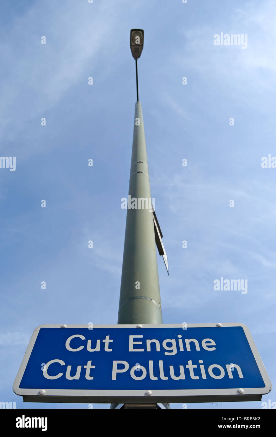cut engine cut pollution sign adjacent to a railway level crossing in ...