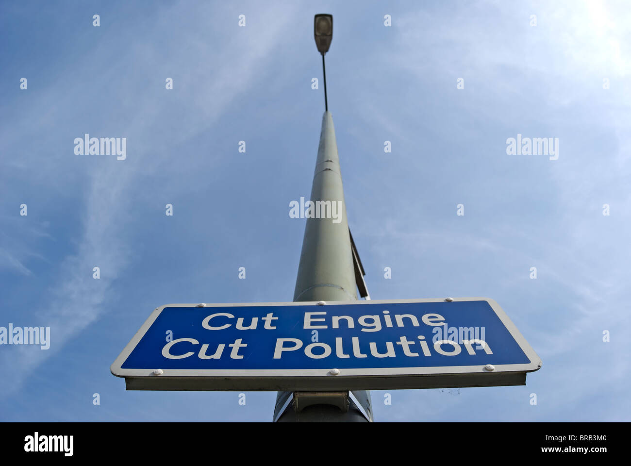 cut engine cut pollution sign adjacent to a railway level crossing in ...