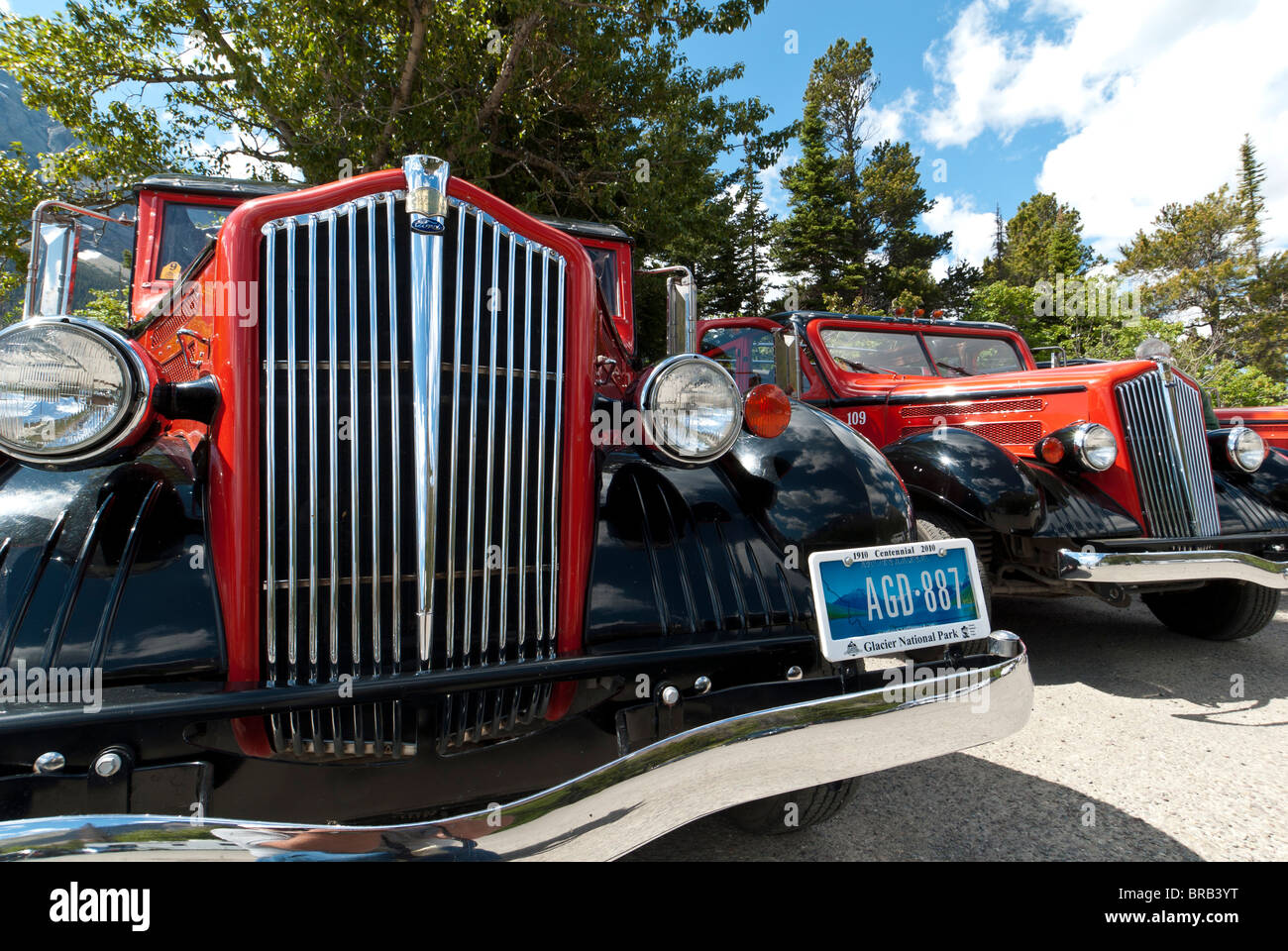 Red bus, Glacier National Park, Montana Stock Photo - Alamy