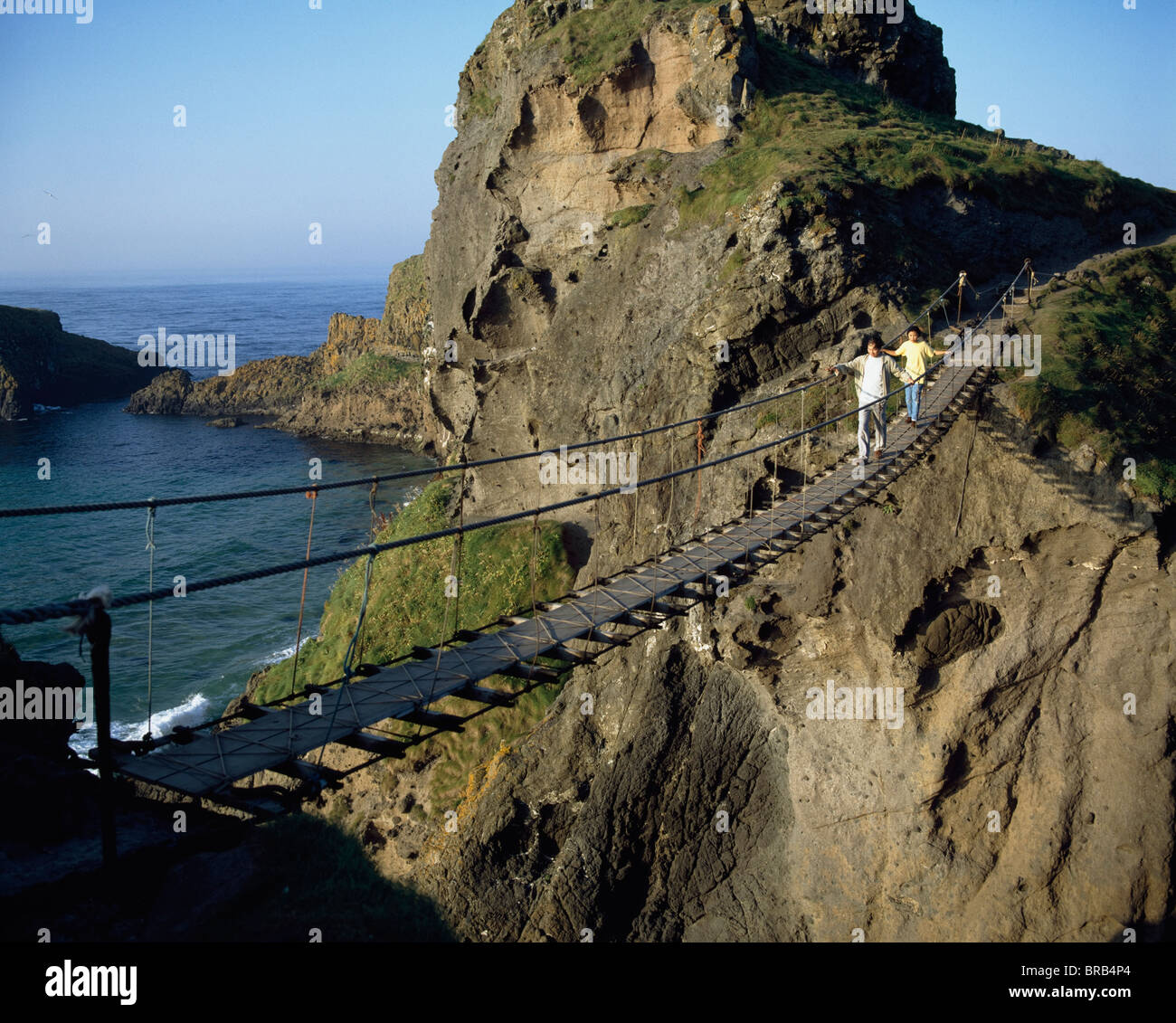 Carrick-A-Rede,Co Antrim,Northern Ireland;Tourists Crossing Rope Bridge ...