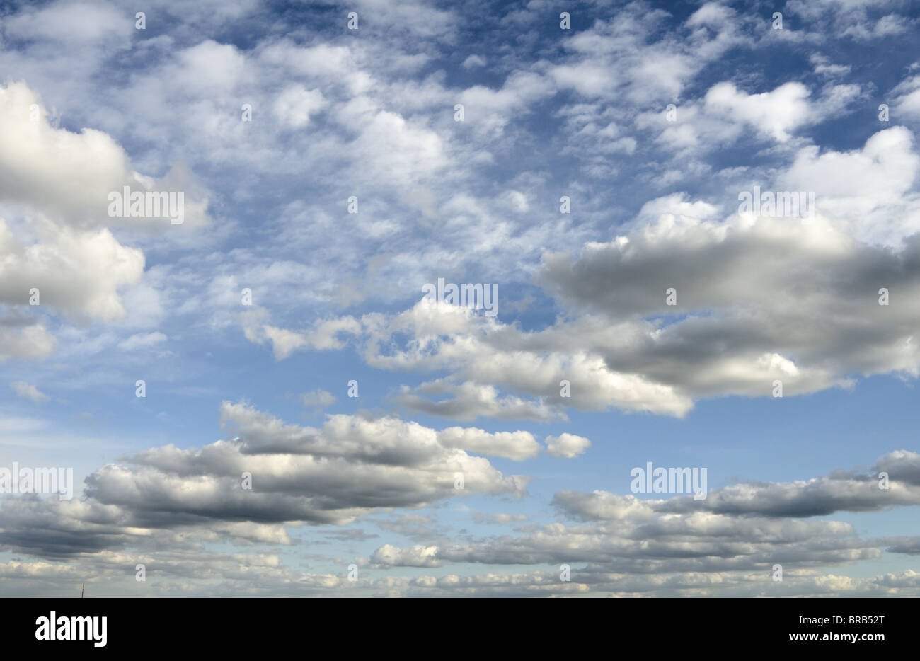 Sunny blue sky with clouds Stock Photo - Alamy