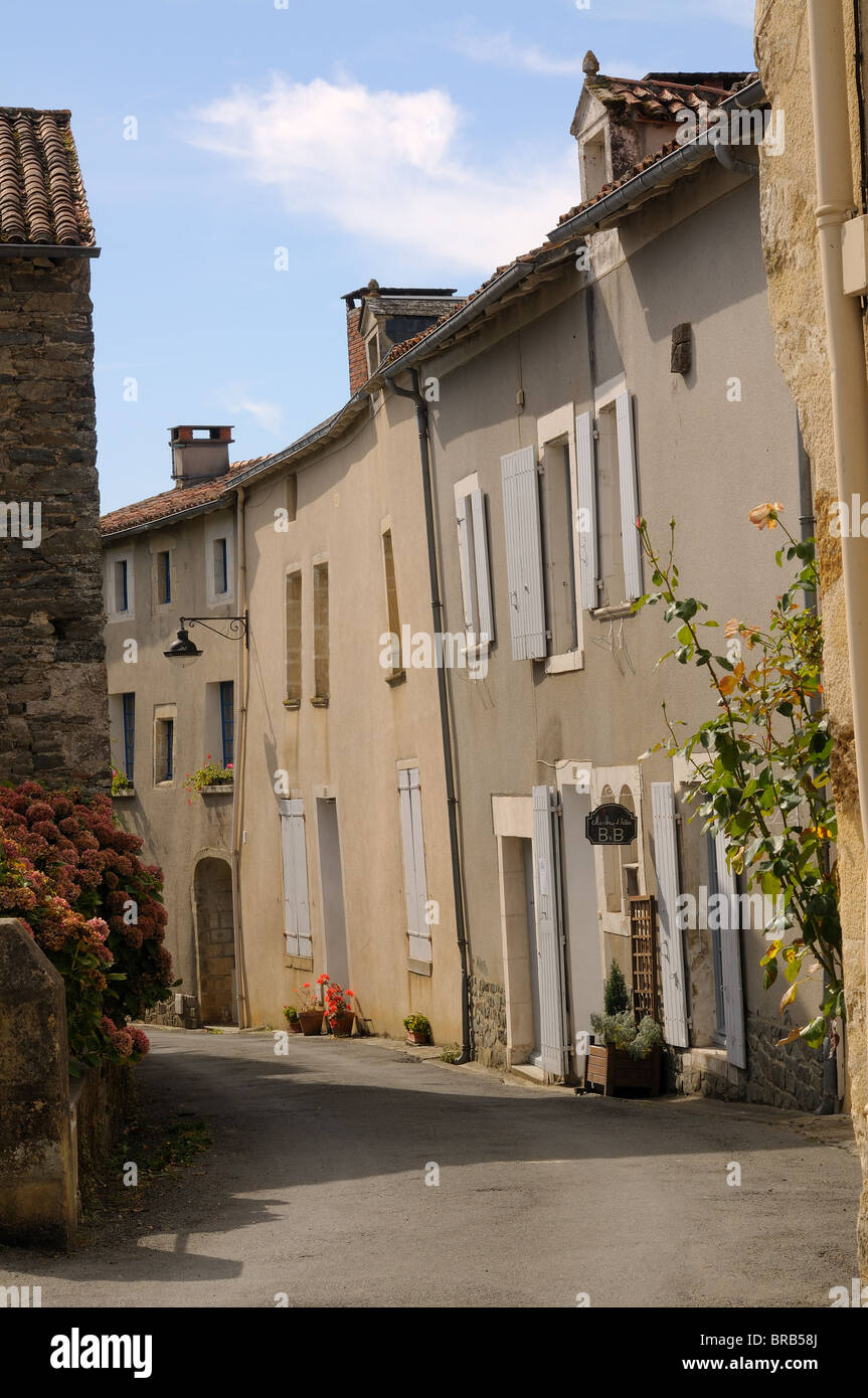 A winding back street in a French village Stock Photo - Alamy