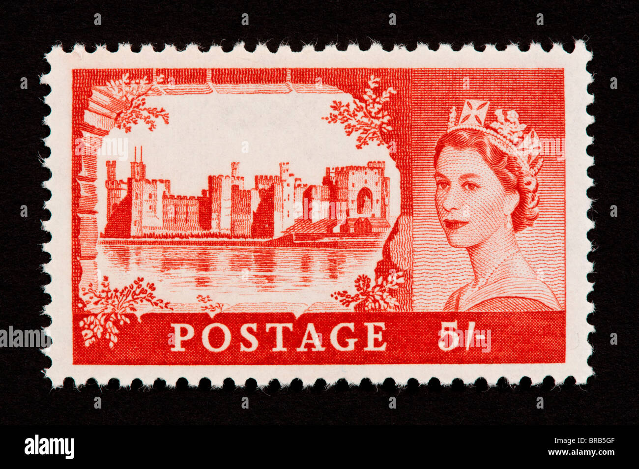 Postage stamp from Great Britain depicting Caernarvon Castle in Wales ...