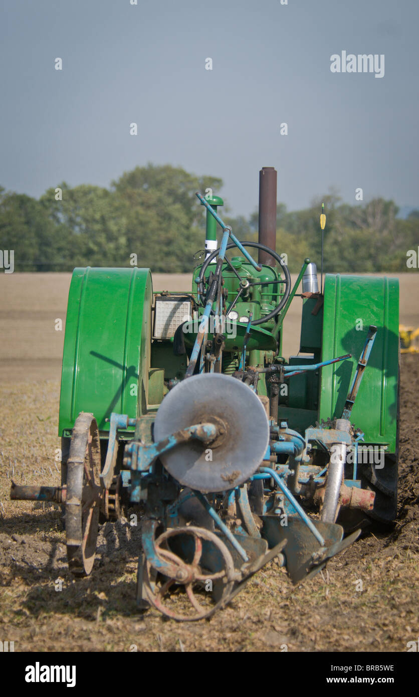 old tractor and plough in field Stock Photo - Alamy
